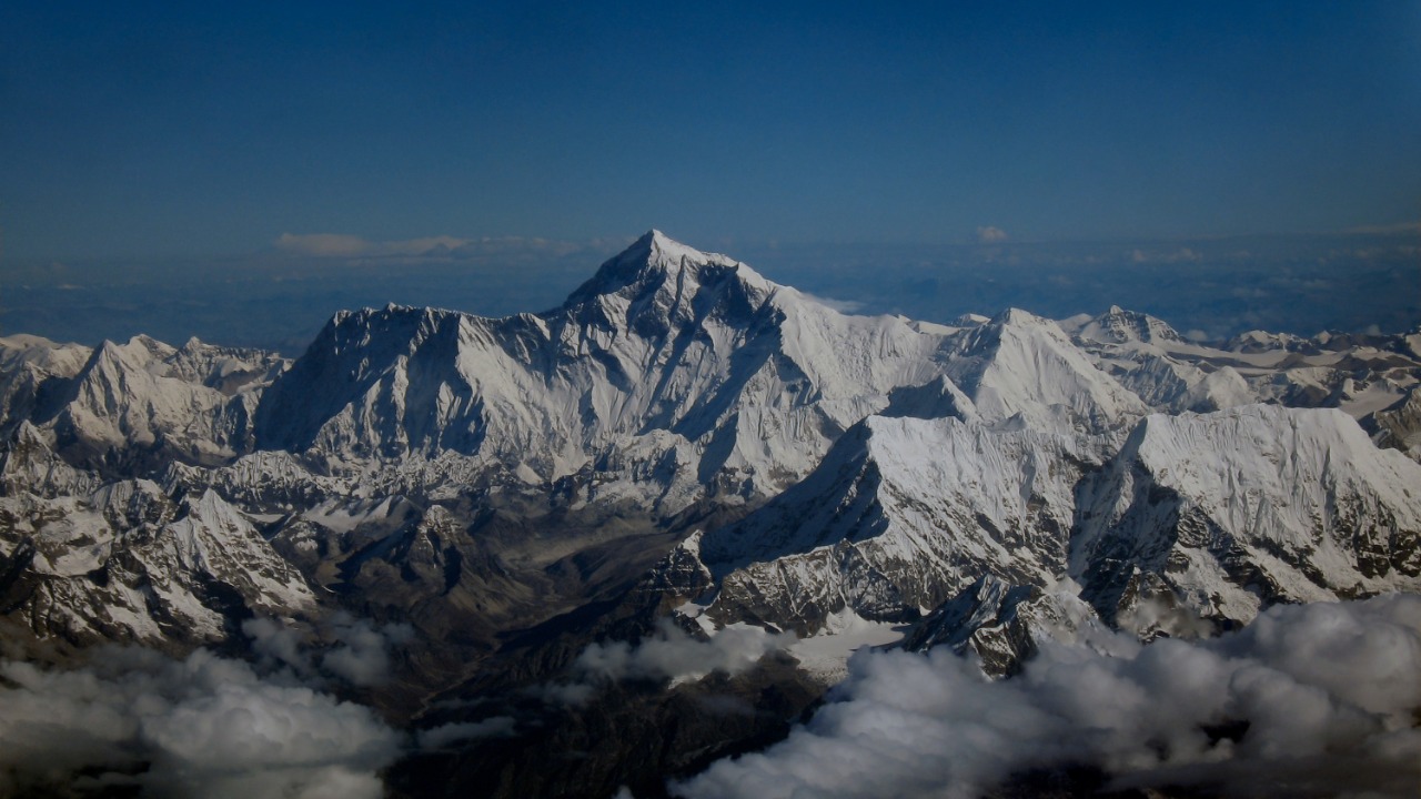 Mount Everest grows a few millimeters taller each year as two plates ...