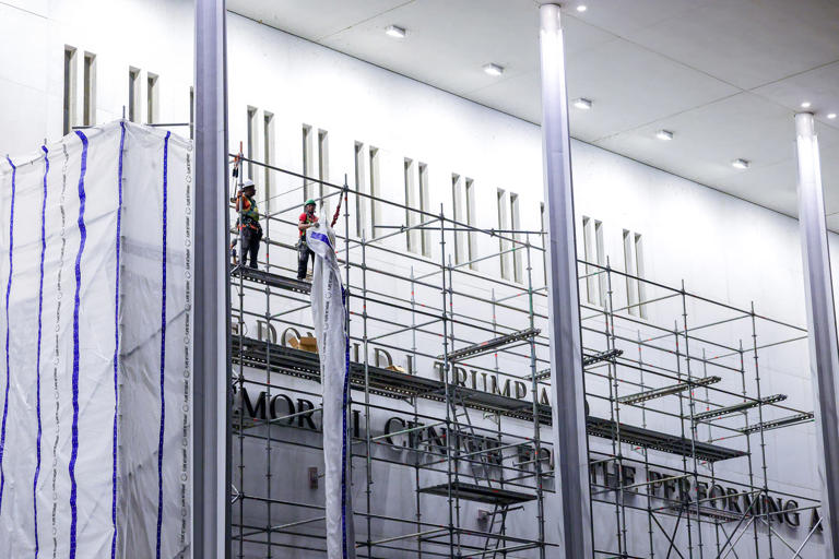 Construction workers begin removing Trump’s name from the Kennedy Center