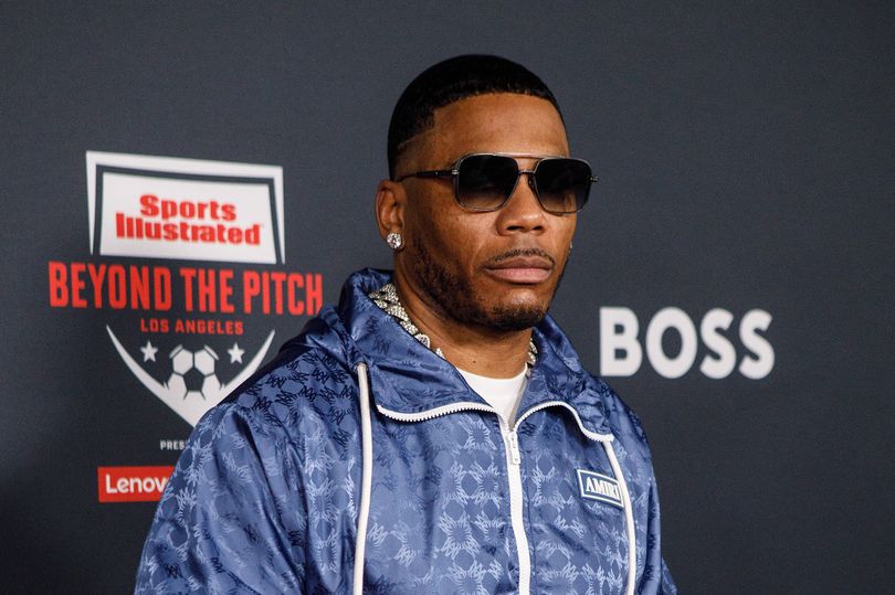 Nelly's hidden tension as he's quizzed over Donald Trump affiliation