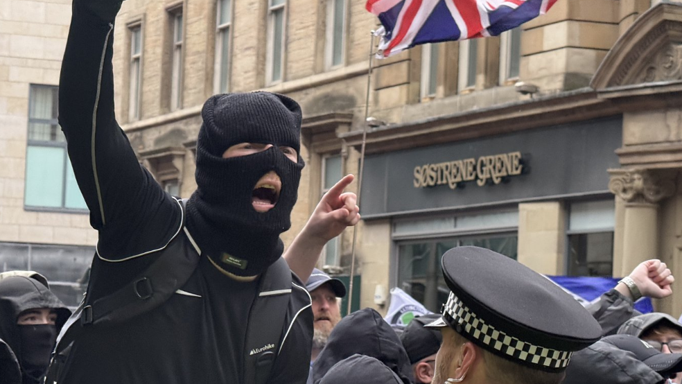 Anti-racism rally disrupted by masked group in Glasgow