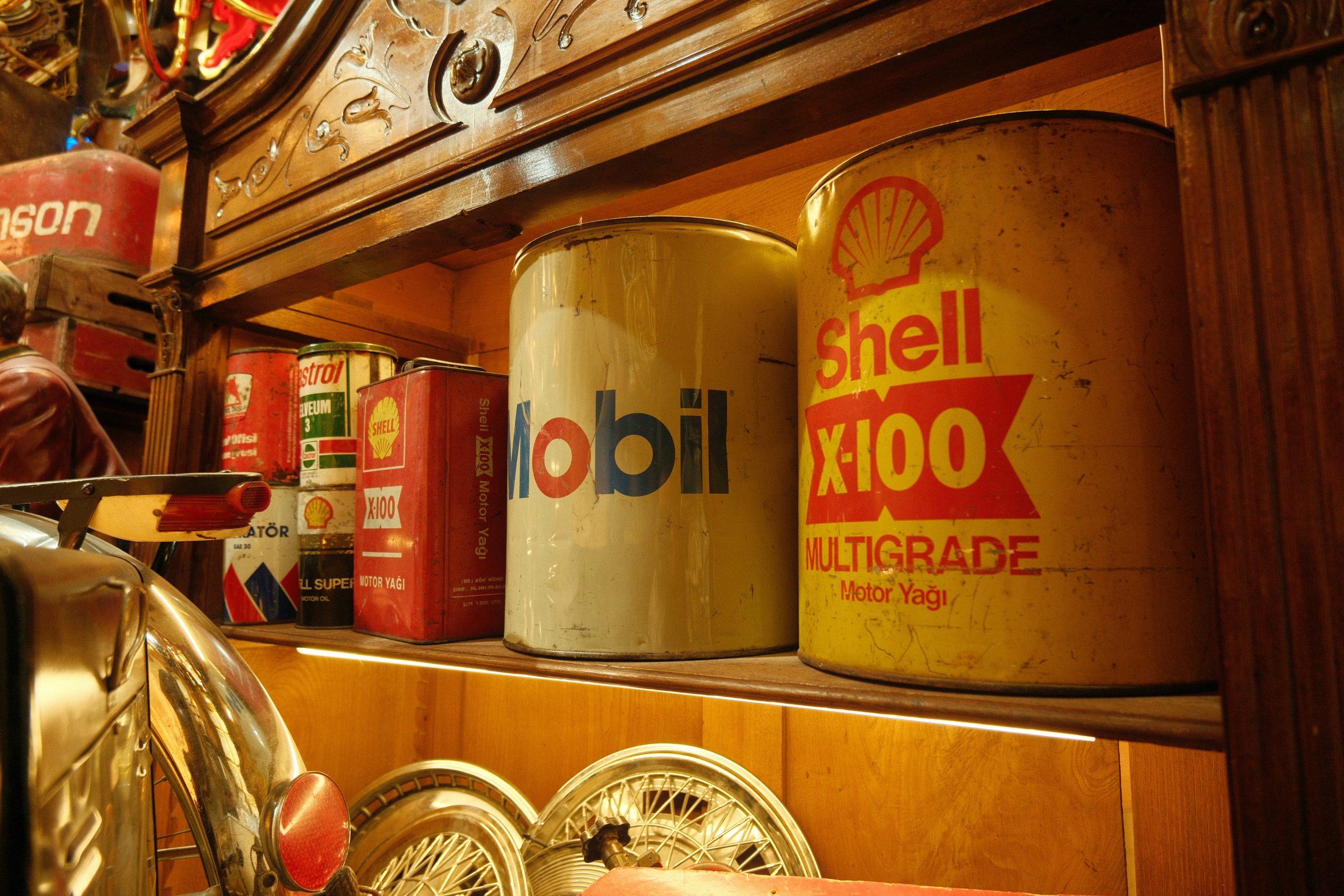 Old oil cans and automotive tins in the garage that petroliana ...
