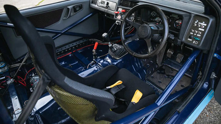 The first car with a factory roll cage was a humble Ford sedan