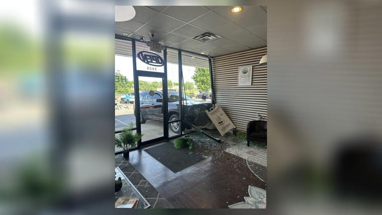 Car crashes into front of local CBD store