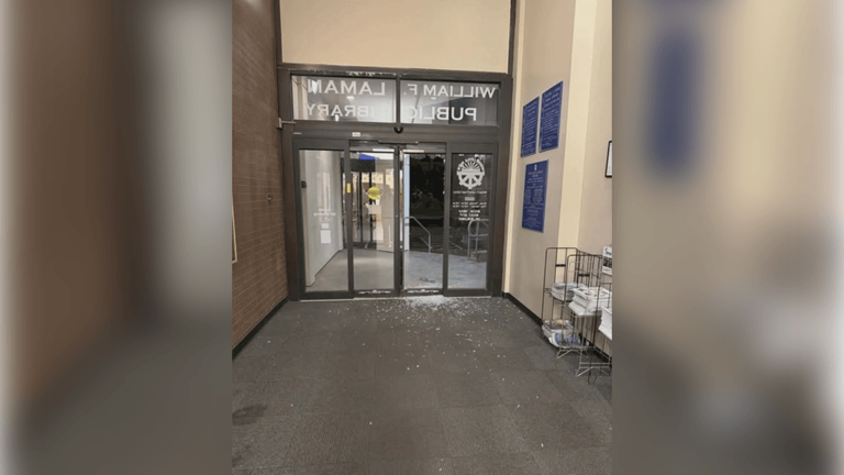 Vandals shatter glass door at Laman Library; North Little Rock police ...