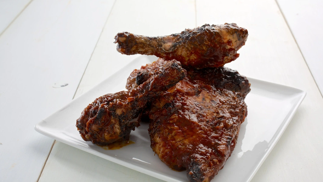 Global history and styles of BBQ chicken