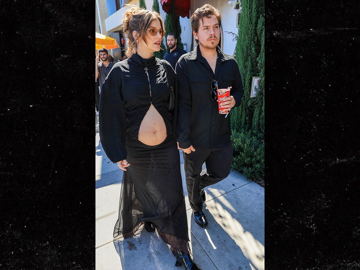 Barbara Palvin flaunts baby bump with Dylan Sprouse for FIFA World Cup ...