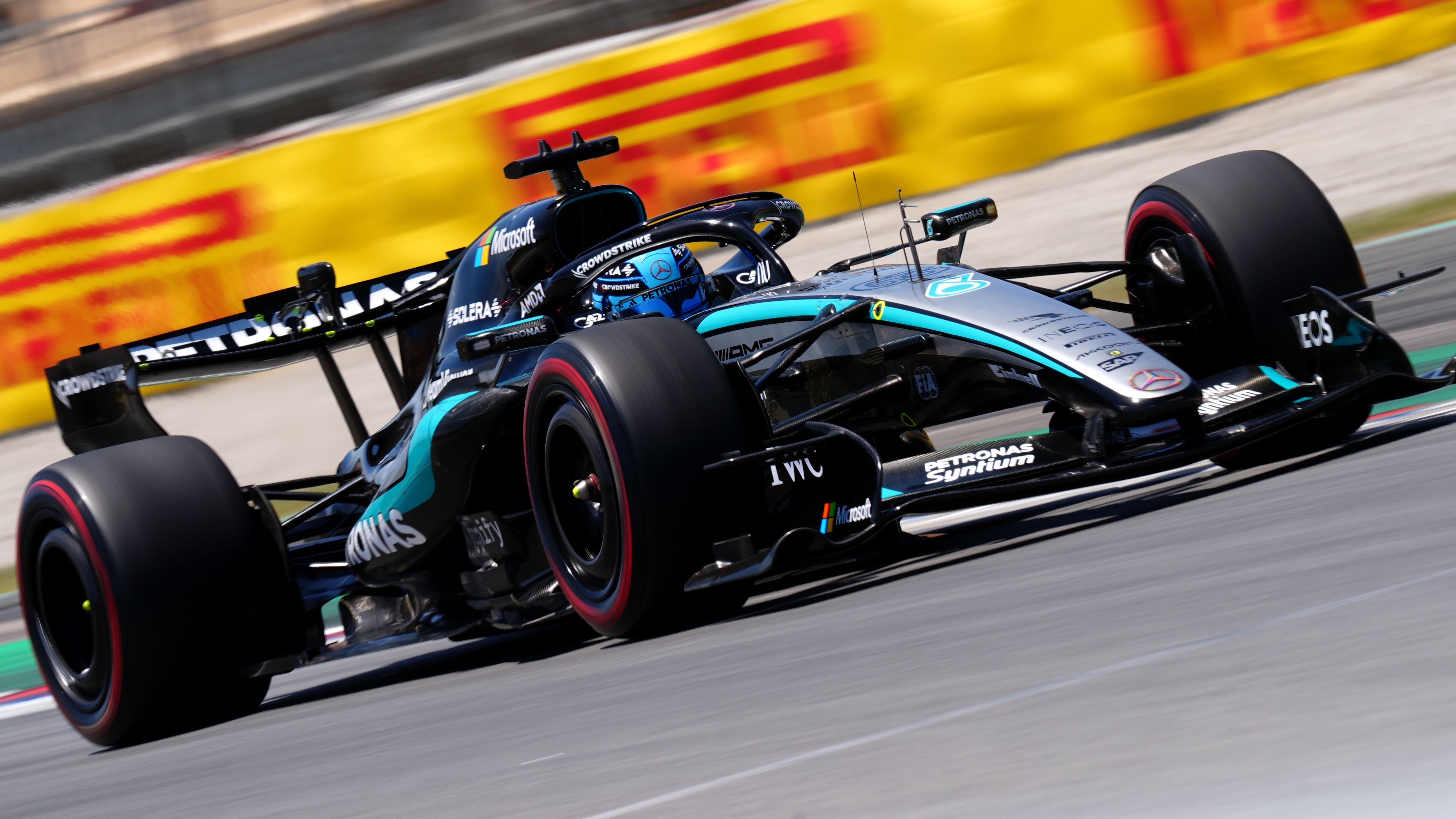 George Russell pips Lewis Hamilton to pole position for Barcelona ...