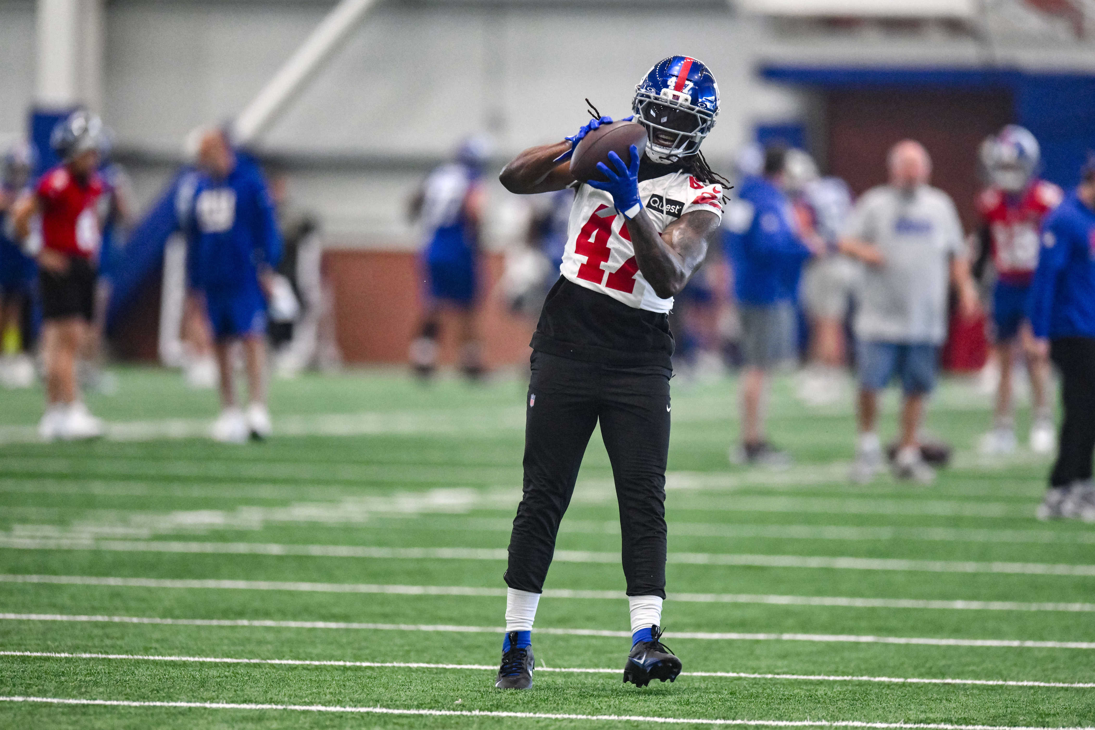 New York Giants LB Cam Jones suffered injury while moving