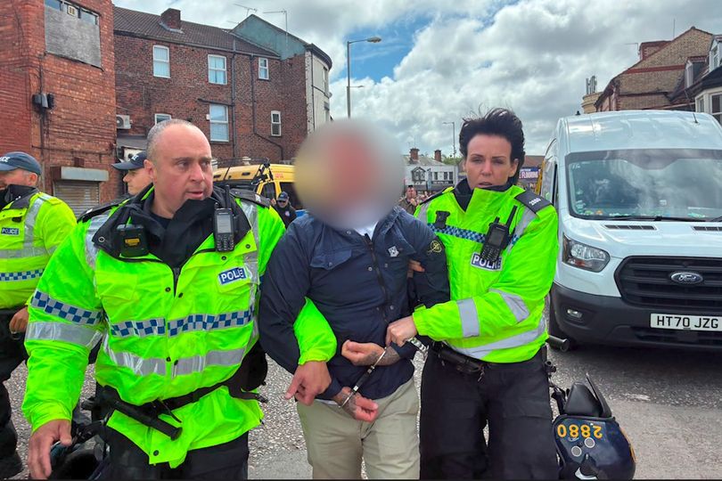Man arrested at County Road protest