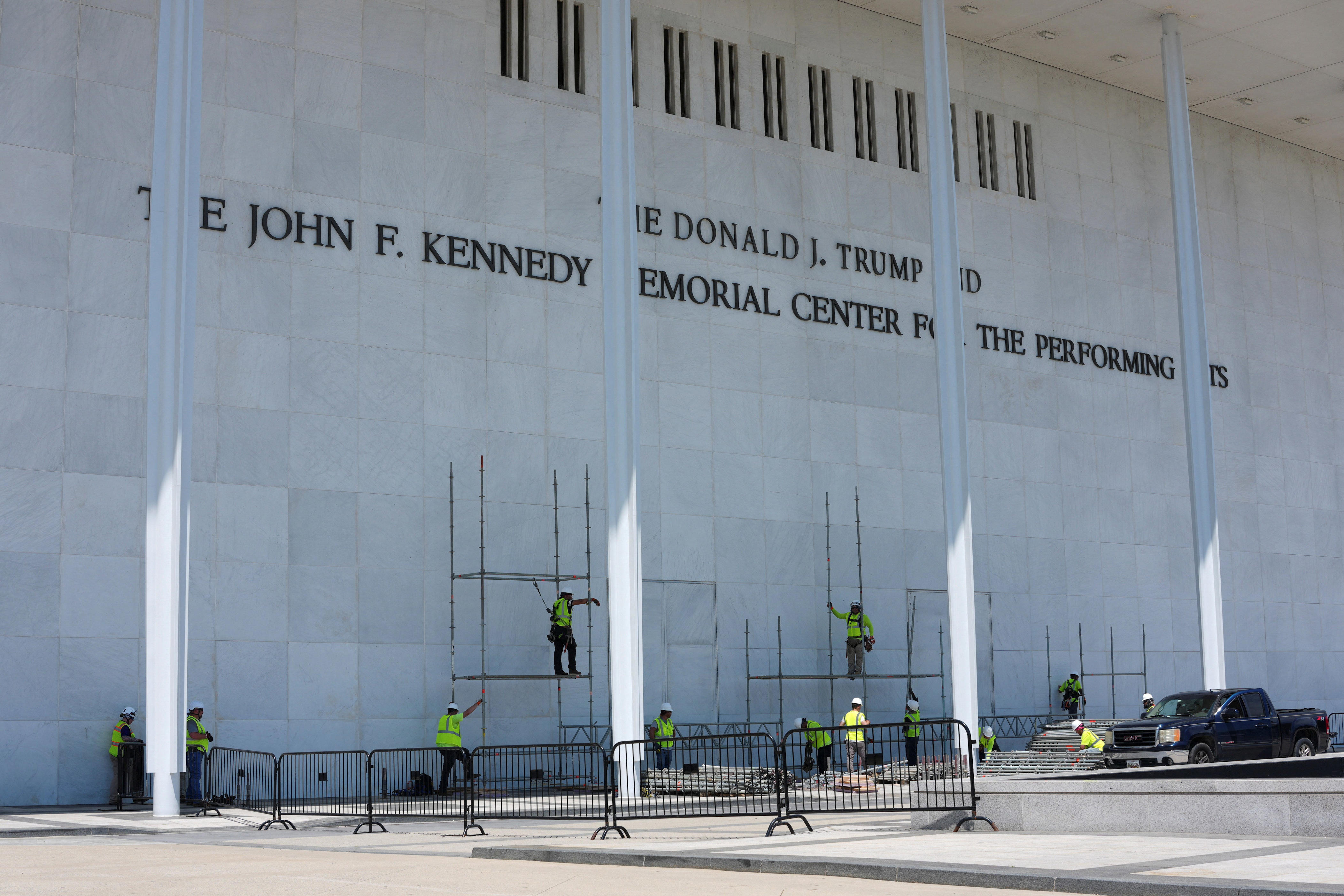 Workers remove Trump's name from Kennedy Center building