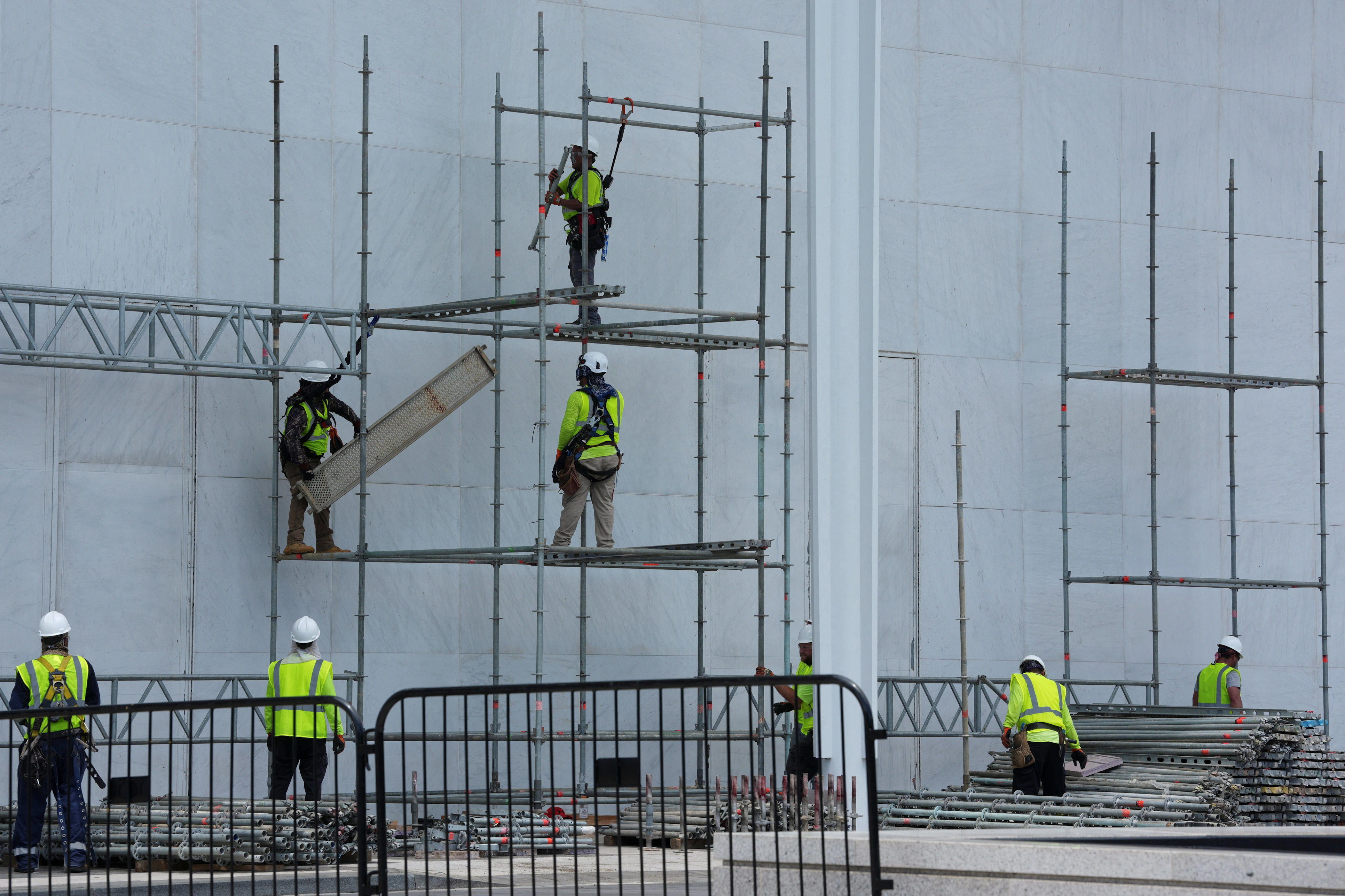 Workers remove Trump's name from Kennedy Center building