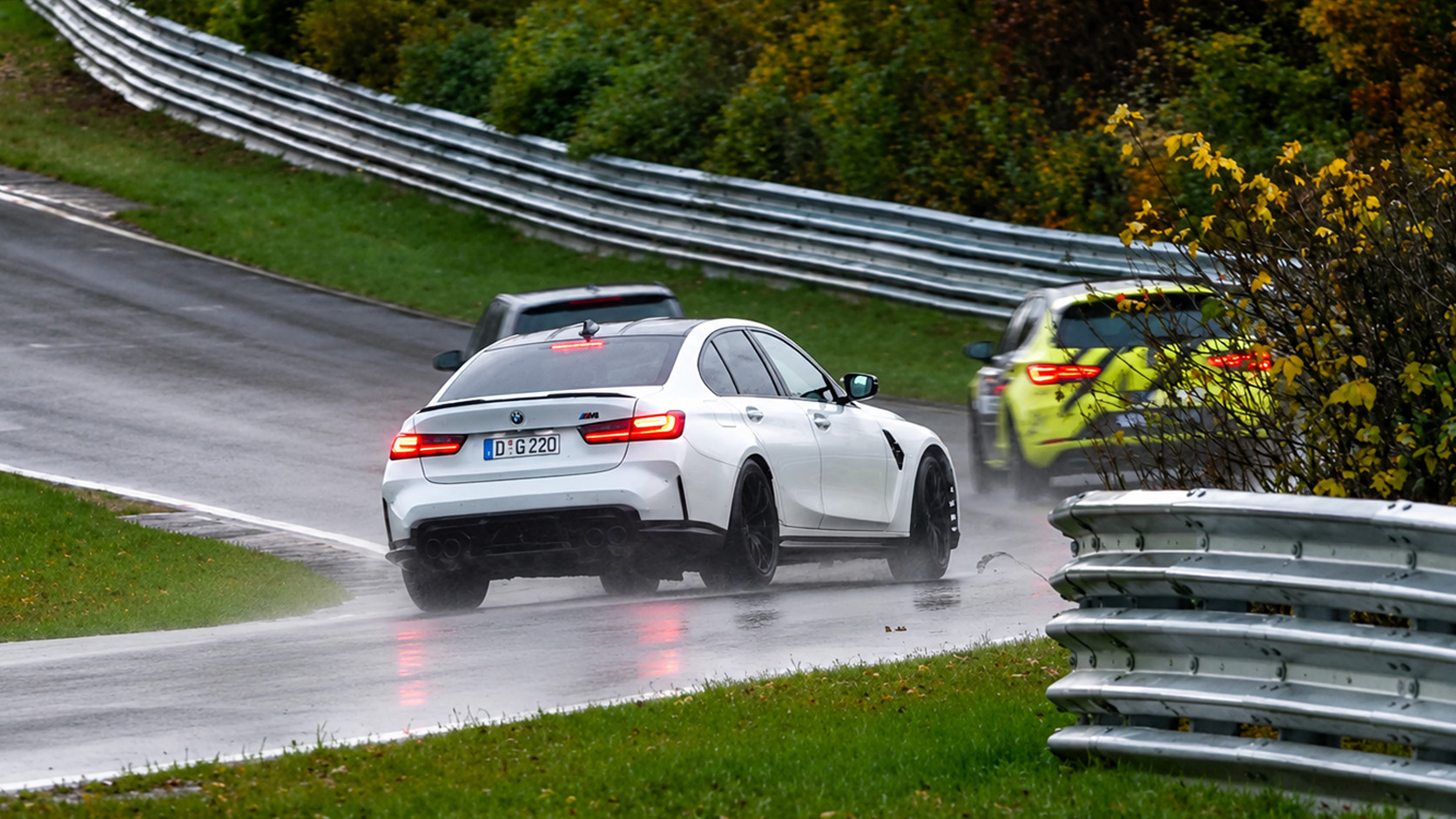 This high speed wet track slip BMW almost triggered a multi car crash