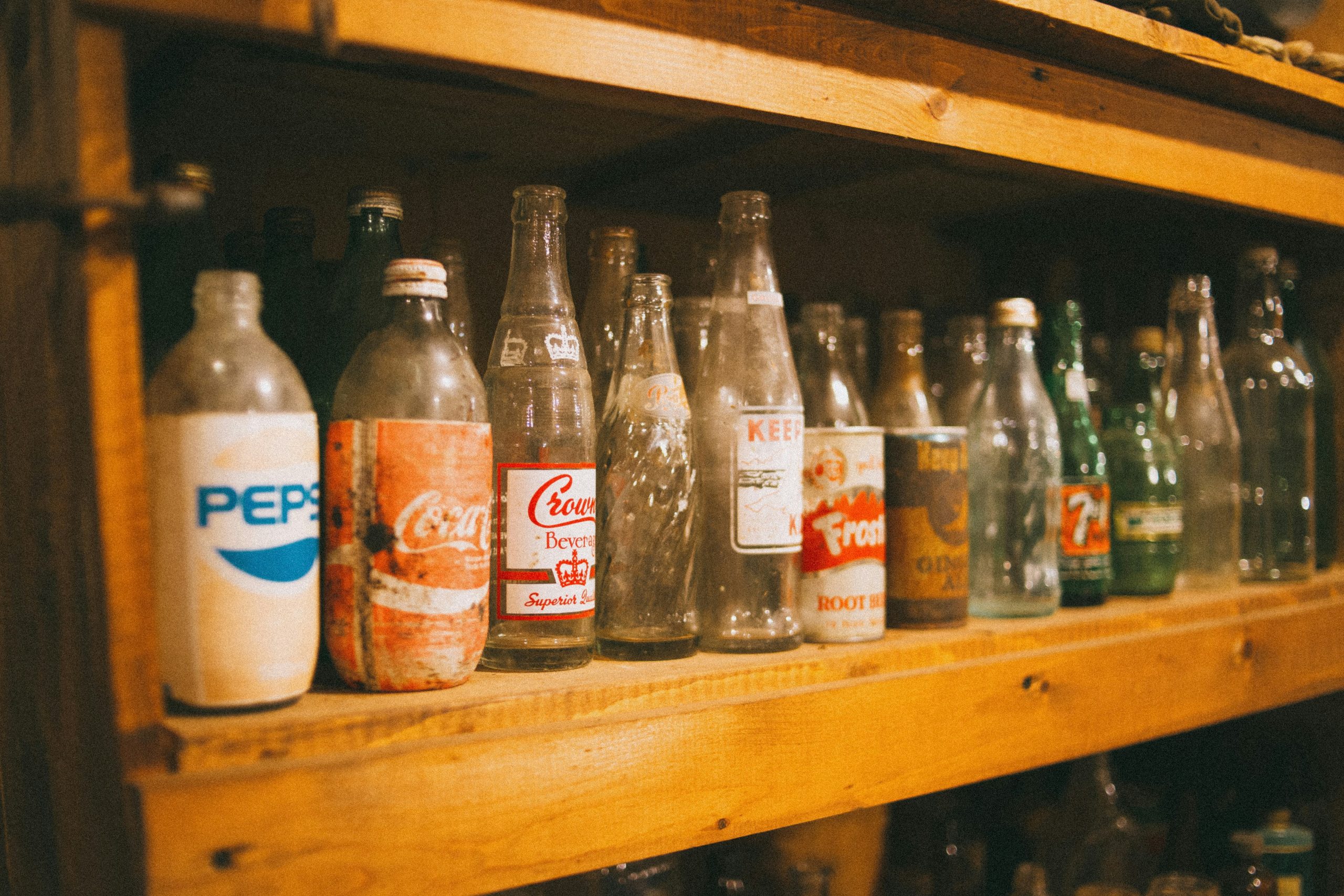 Old soda bottles with specific city markings that collectors pay real ...