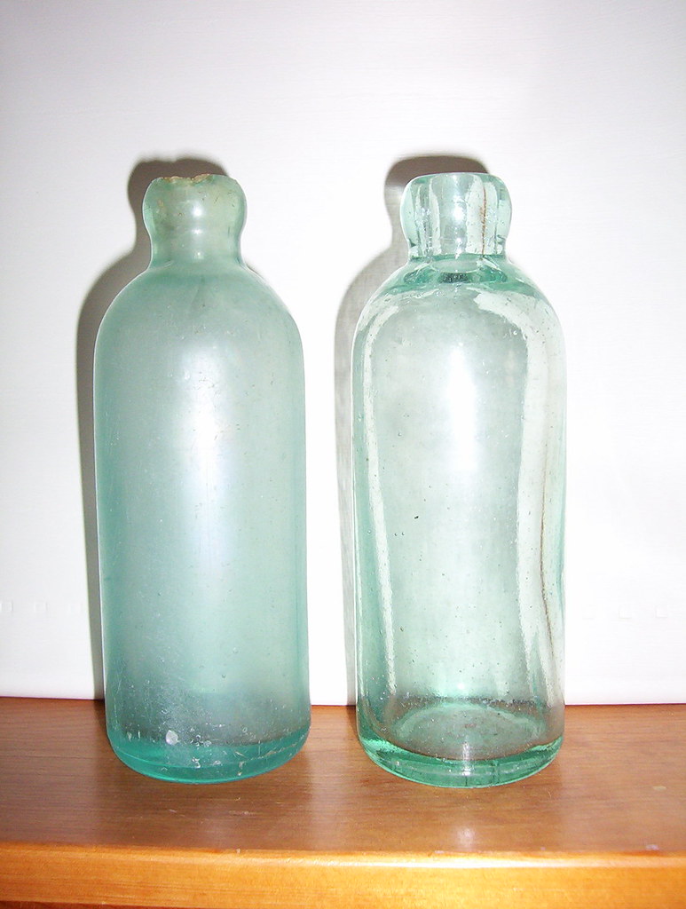 Old soda bottles with specific city markings that collectors pay real ...