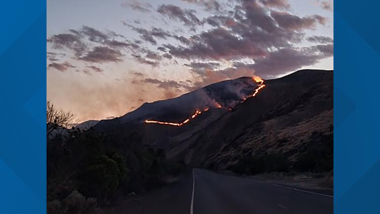 Firefighters are at the scene of a wildland fire in Whitman County