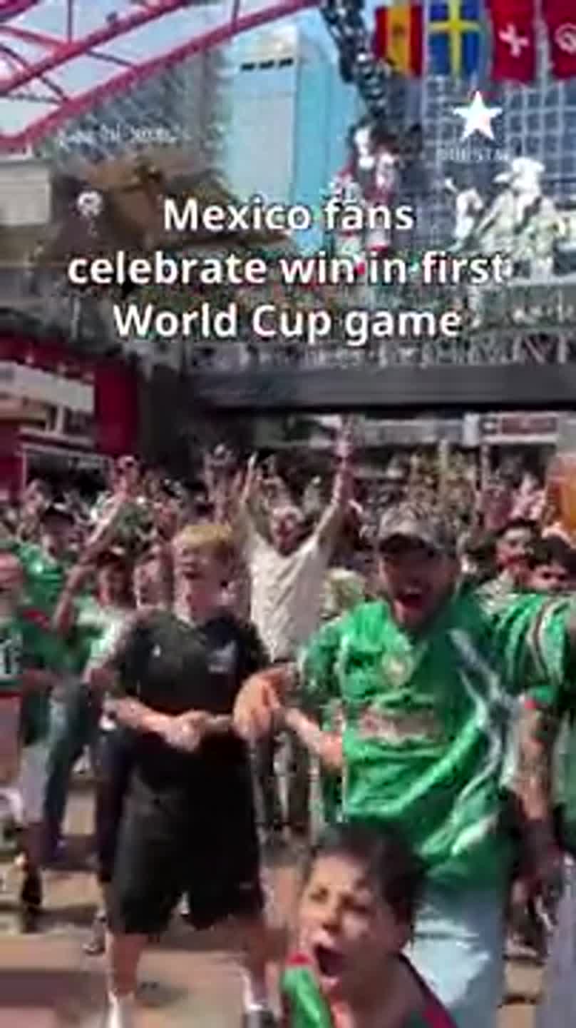 Mexico fans partying in the Power & Light District celebrate first game
