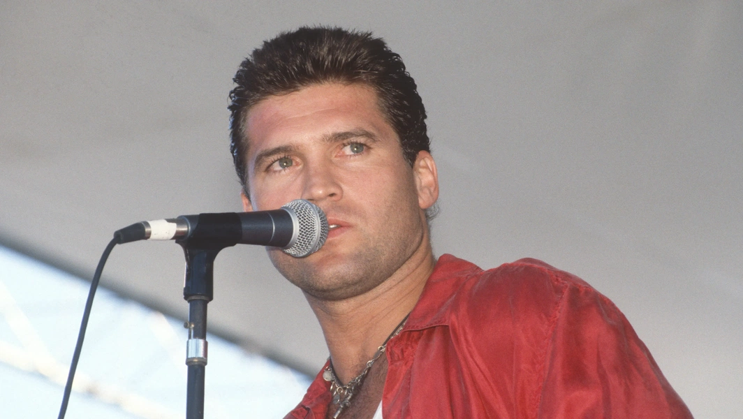 15 country songs with notable chart and award success