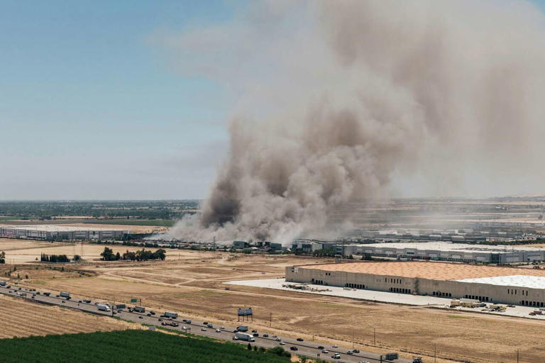 Massive Tracy warehouse fire could last a few more days as crews battle ...