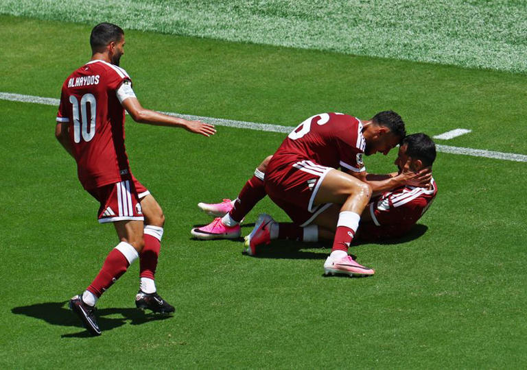 Soccer-'We have the right to dream': Qatar keep faith after crucial draw