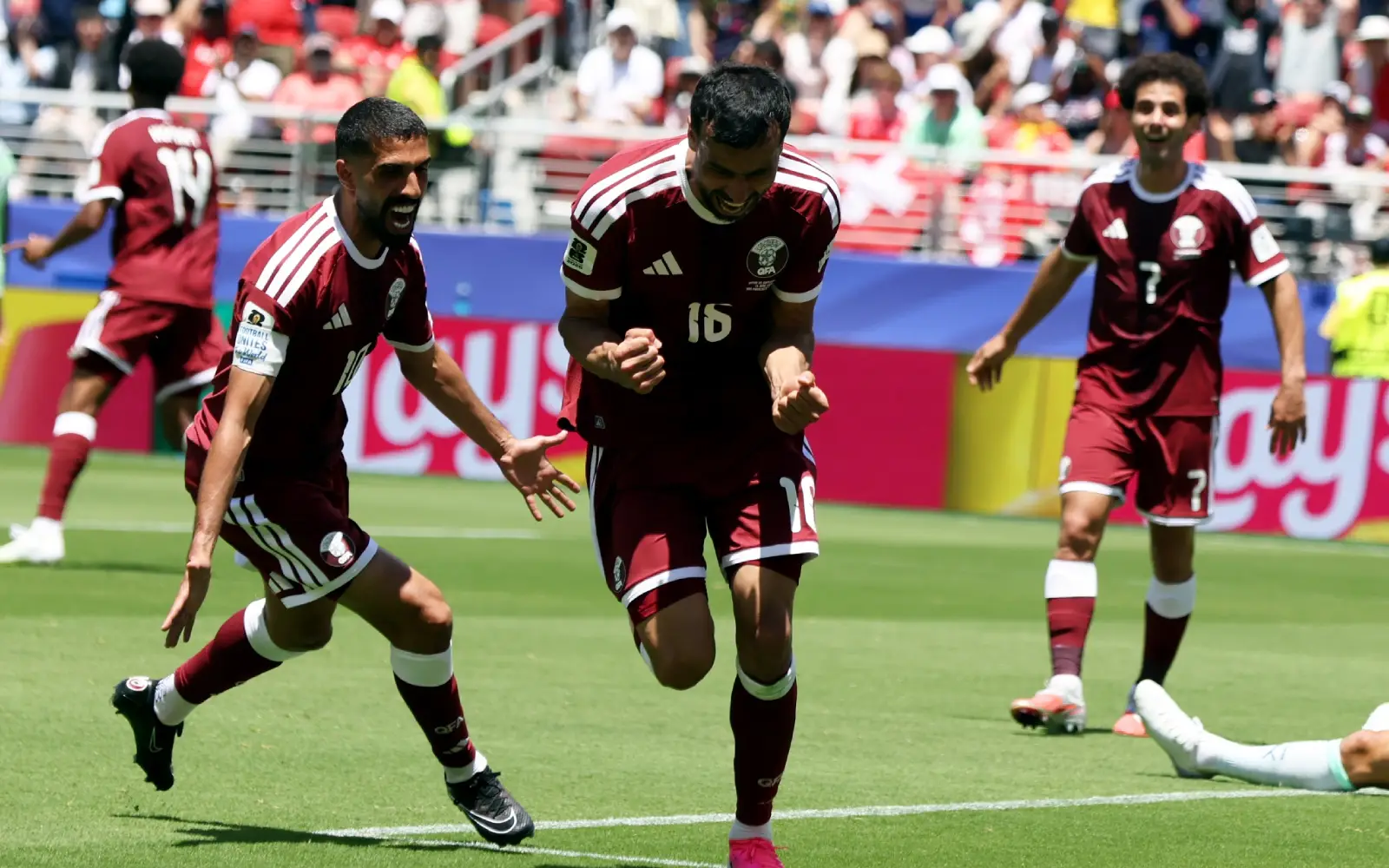 Qatar earn first-ever World Cup point with late goal
