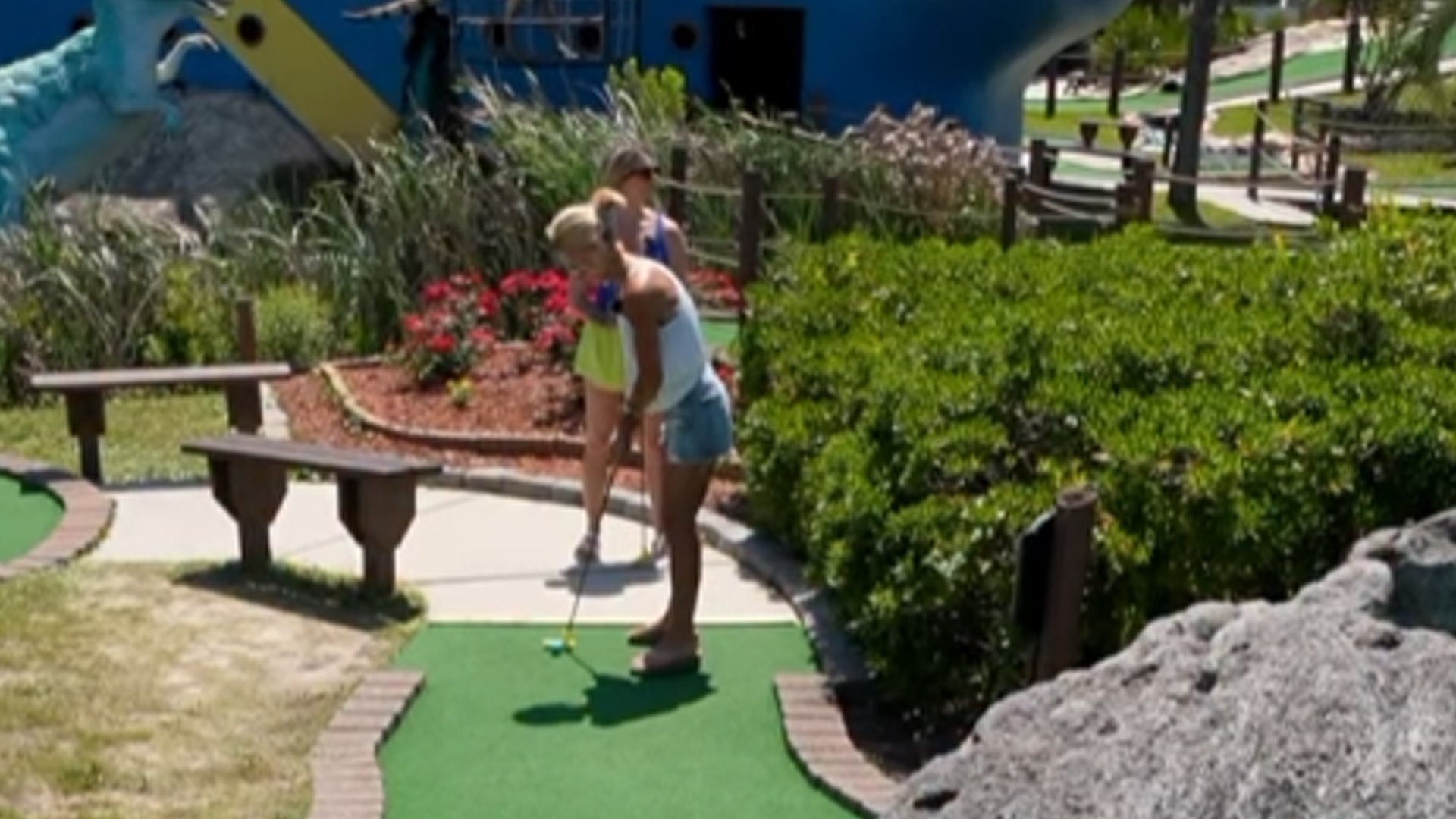 Dinosaur adventure mini golf match