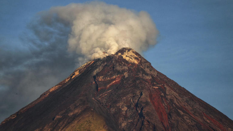 The Philippines kept Mayon at alert level 3 as the volcano spilled ...