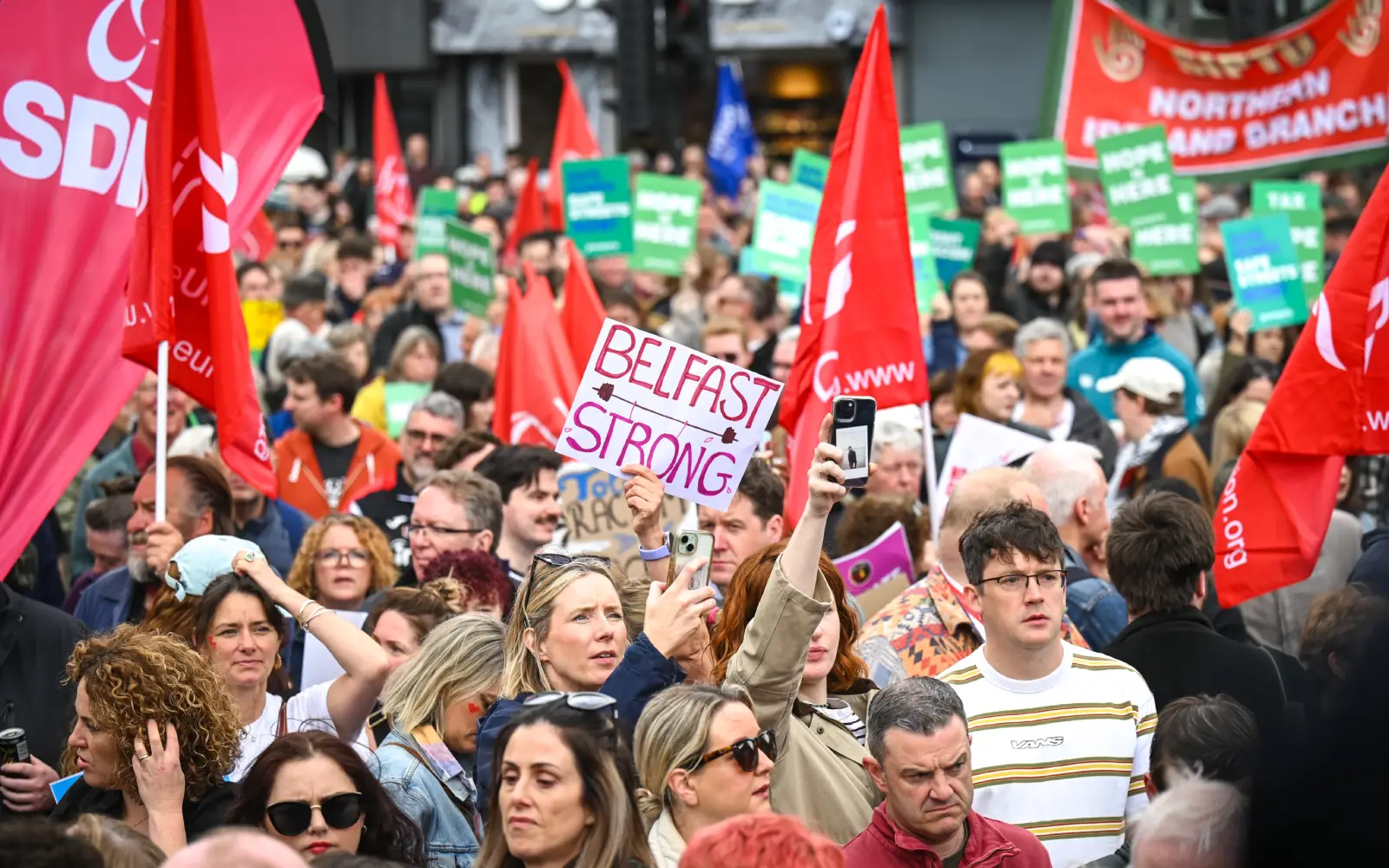 Thousands turn out for anti-racism rally after Belfast unrest