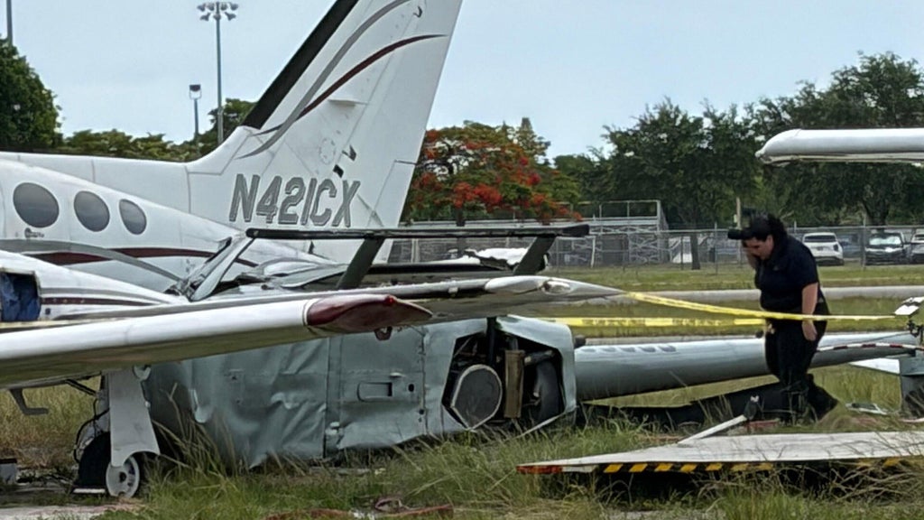 Helicopter crashed into vacant plane at Pembroke Pines airport, injuring 2