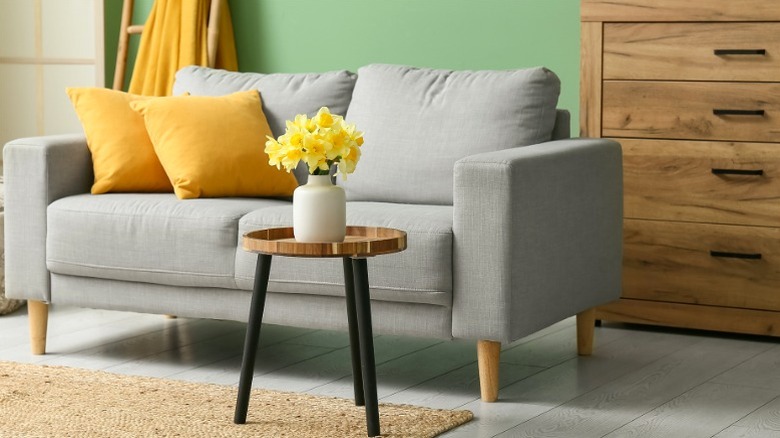 Couch mistakes that make a small living room feel even more cluttered
