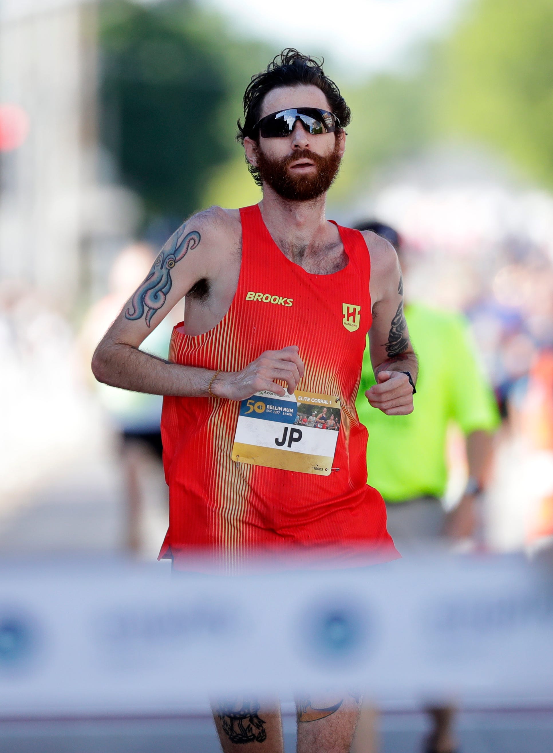 JP Flavin repeats as Bellin Run 10K champion; Smith wins women's title