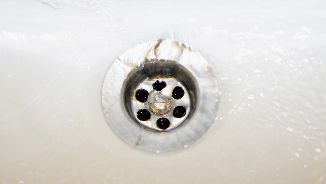 Preventing and clearing household drain clogs