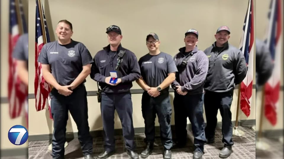 Local firefighters given life-saving award after saving man's life