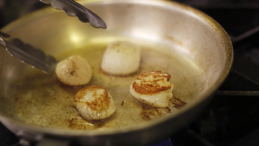 Mastering scallop selection, searing, and serving