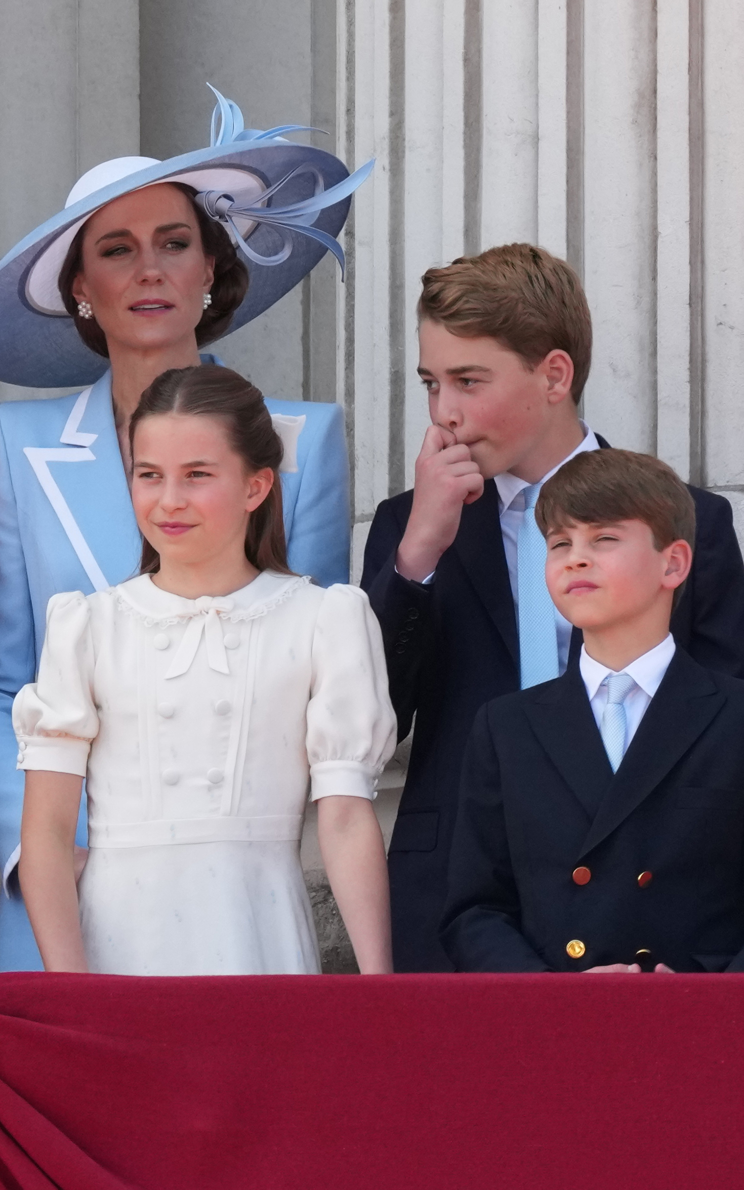 Prince George fights off sneeze during national anthem, cracks up with ...