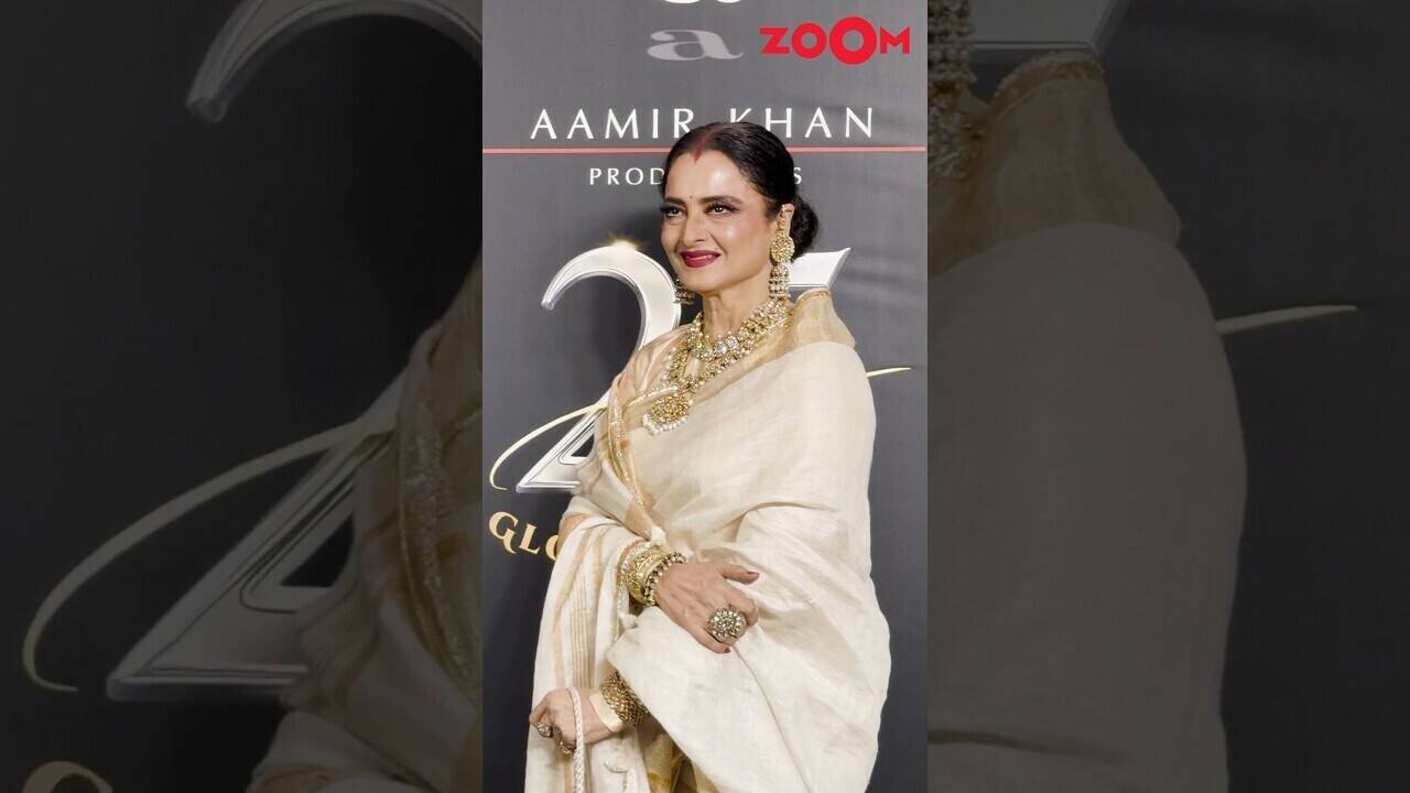 Rekha showcases her stunning smile while attending an event hosted by ...