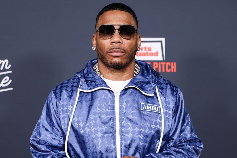 Nelly's hidden tension as he's quizzed over Donald Trump affiliation