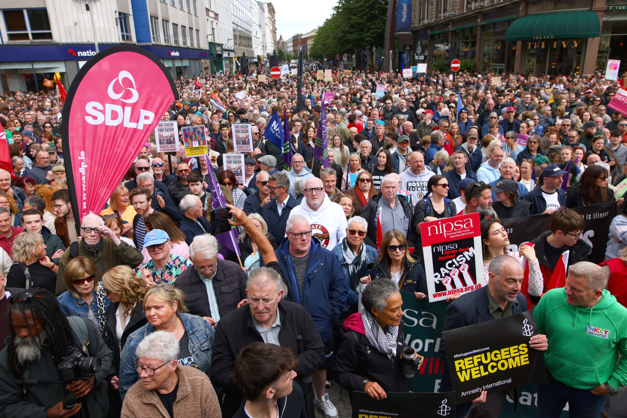 Tens of thousands rally in Europe over migration debate