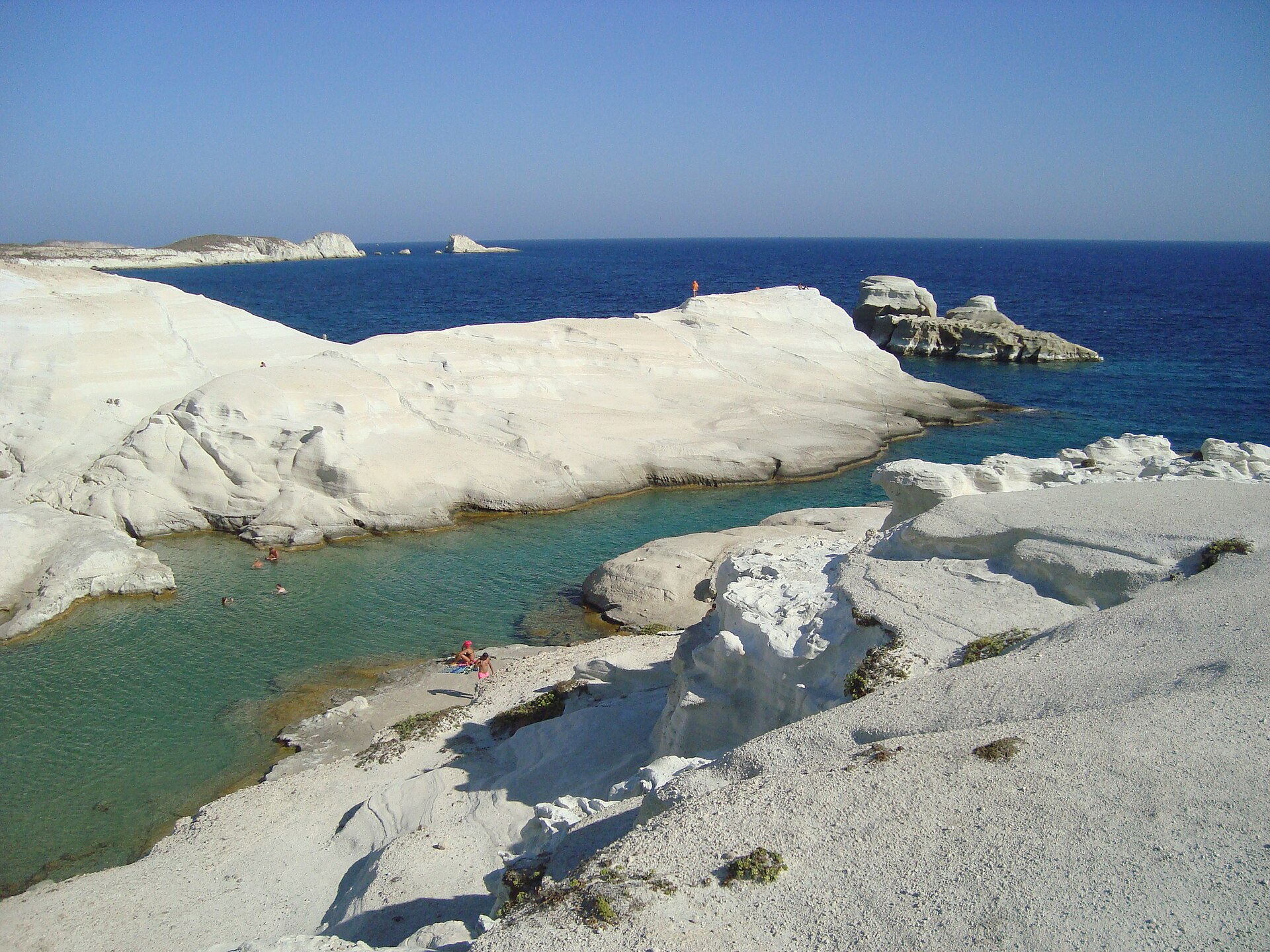 Europe’s most strikingly colorful beaches, from red cliffs to black sand