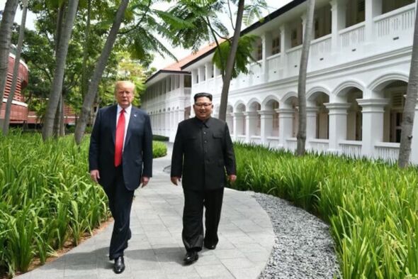Trump posts himself strolling with Kim Jong Un after making nuclear ...