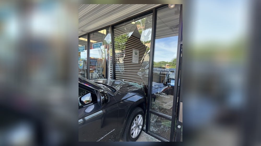 Car crashes into front of local CBD store