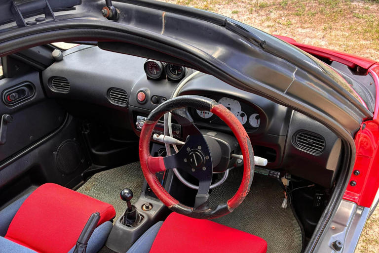 $24K for a 63-HP Mazda kei car sounds steep, until you see the gullwing ...
