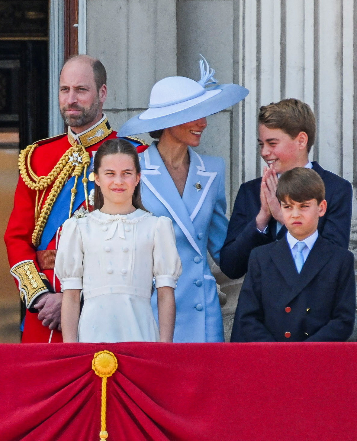 Prince George fights off sneeze during national anthem, cracks up with ...