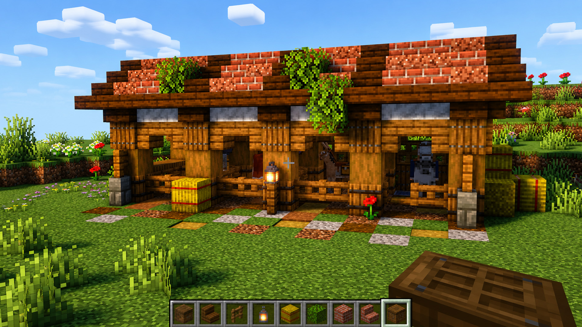 Minecraft horse stable design with three stalls and storage