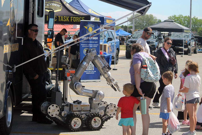 Families enjoy fun, sun, safety at annual Manistee event
