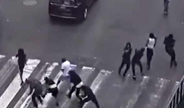 Moment 'shots fired' in Times Square as gunman seen 'discharging ...