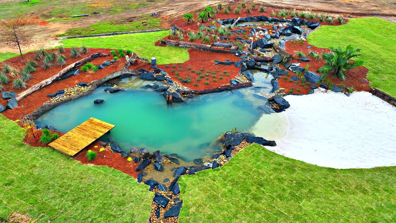 Our new pond build is finished! (Giant waterfall)