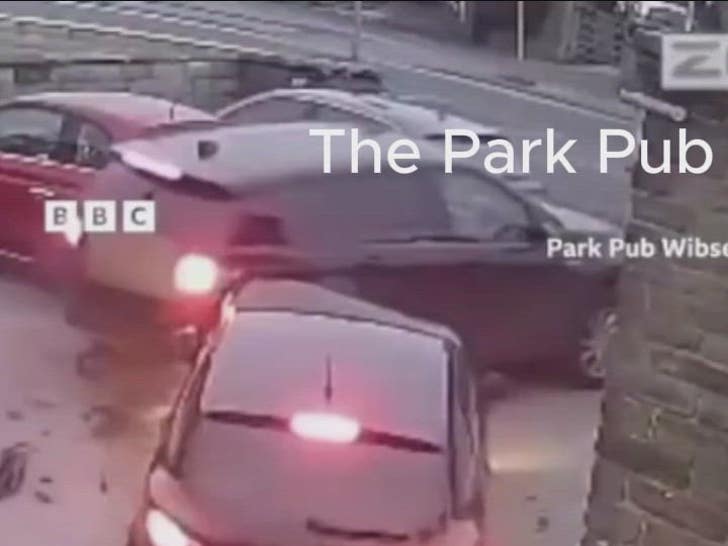 Driver plows through cars before crashing into building