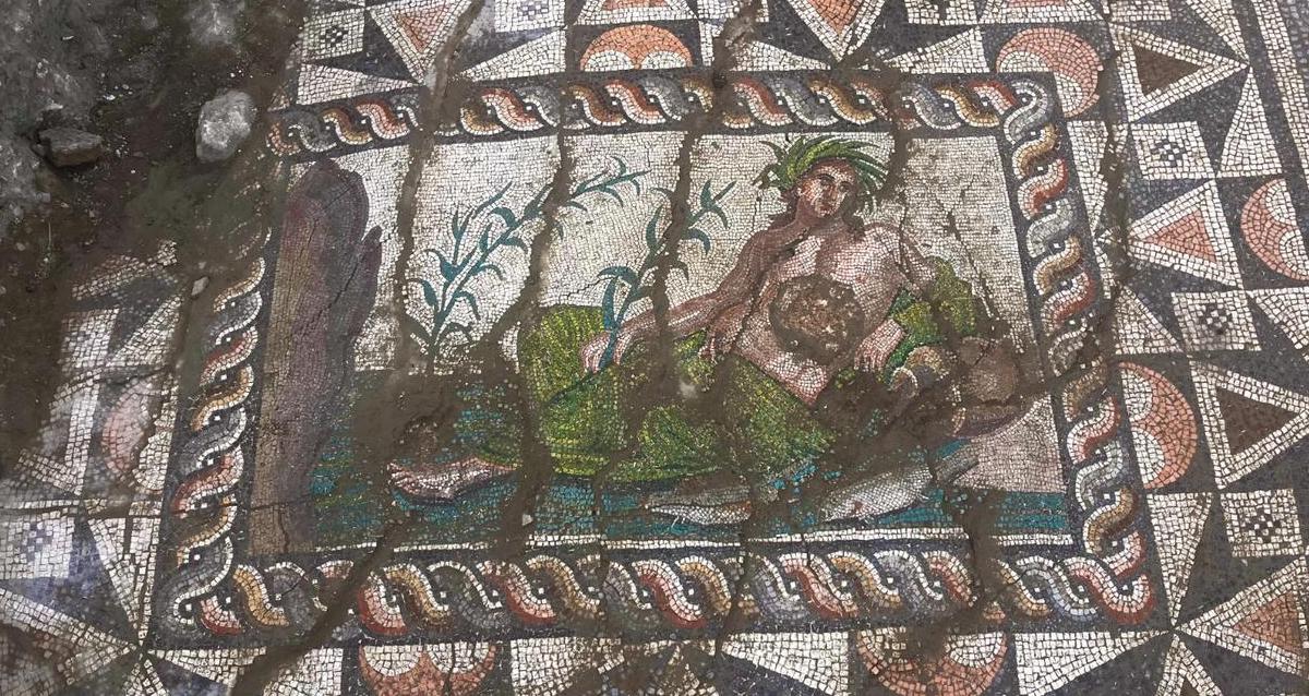 An 1,800-year-old Roman mosaic depicting a river god surrounded by fish ...