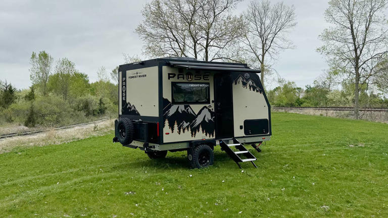This compact off-road camper has two kitchens and a full bathroom