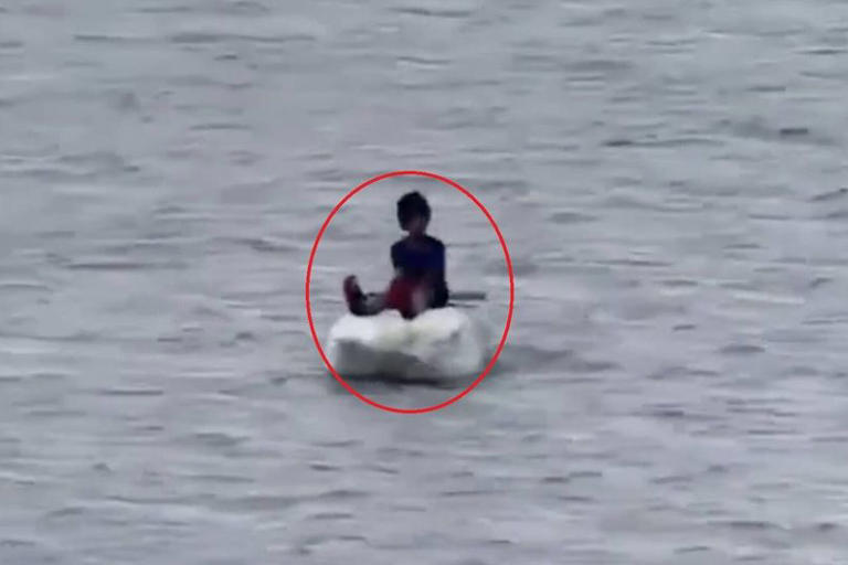Fisherman spots missing boy, 11, floating alone at sea on polystyrene
